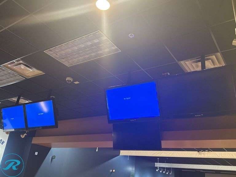 (4) Accuvision Monitors with Ceiling Mounts - Roller Auctions