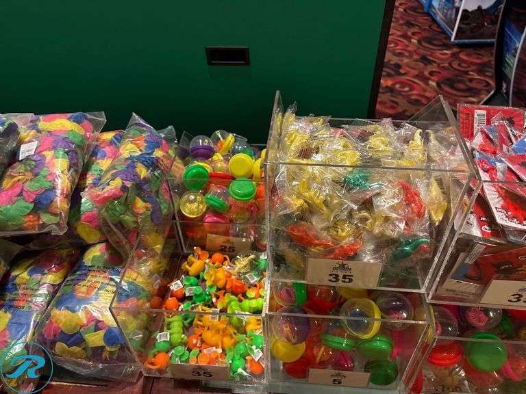 Assorted Game Prizes Including Toys, Novelties, and Small Accessories ...