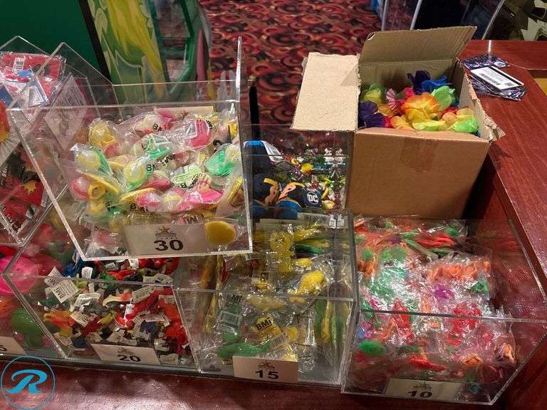 Assorted Game Prizes Including Toys, Novelties, and Small Accessories ...
