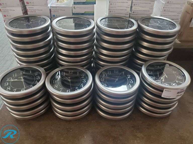 (61) Howard Miller Wall Clocks with Black Dials and Silver-Tone Frames - Roller Auctions