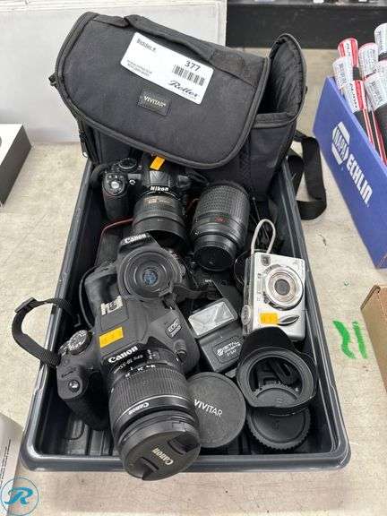 Tray of Cameras, Lenses, and Accessories Including Nikon D3100, Canon ...
