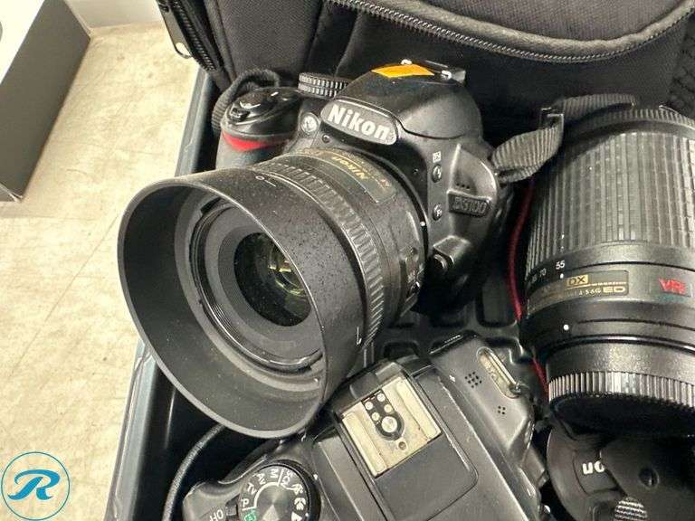 Tray of Cameras, Lenses, and Accessories Including Nikon D3100, Canon ...