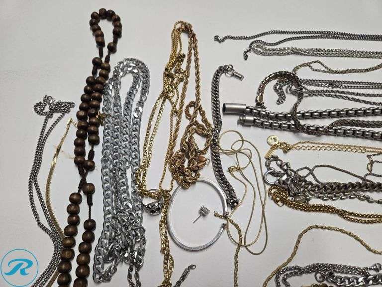 Jewelry Including Chains, Rings, Crosses, and Bracelets - Roller Auctions
