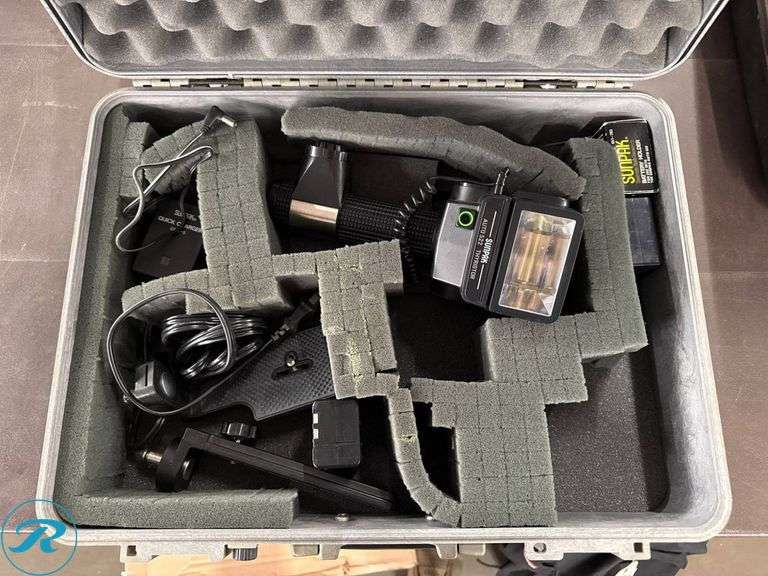 Two Hard Cases with Assorted Camera Equipment and Accessories - Roller Auctions