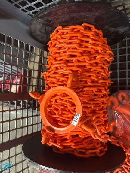 Spool of Orange Chains with Hardware in Plastic Crate - Roller Auctions