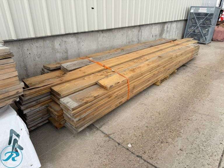 Bunk of 2″ x 10″ Lumber Includes Lengths of 14′ and 20′ - Roller Auctions