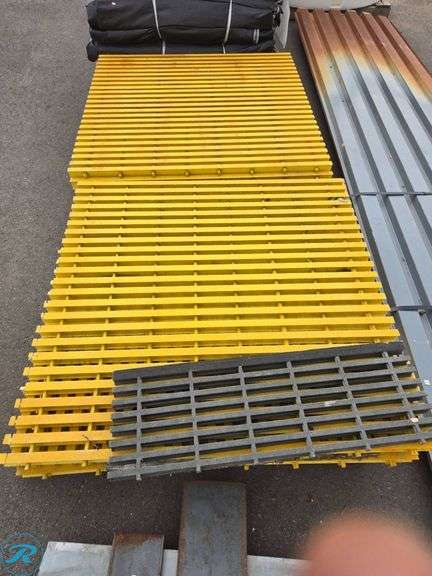Stack of Yellow Coated Steel Grating Panels - Roller Auctions