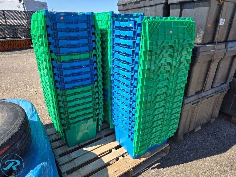 Stacked Plastic Storage Totes in Green and Blue - Roller Auctions
