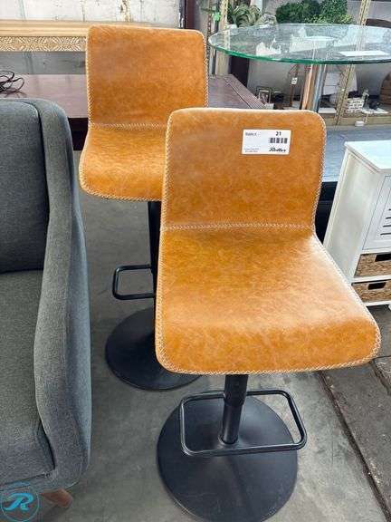 (2) Upholstered Faux Leather Adjustable Bar Stools with Black Metal Bases - Roller Auctions