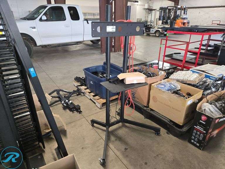 Viv Tilting Rolling TV Stand with Accessories - Roller Auctions