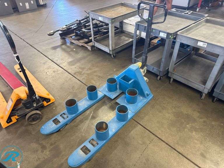 Blue Pallet Jack with Custom Cylinder Holders - Roller Auctions