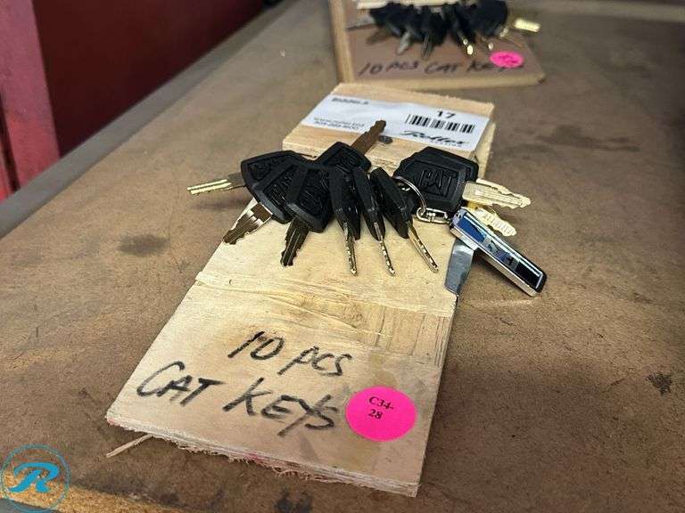 (10) New Caterpillar Keys - Roller Auctions
