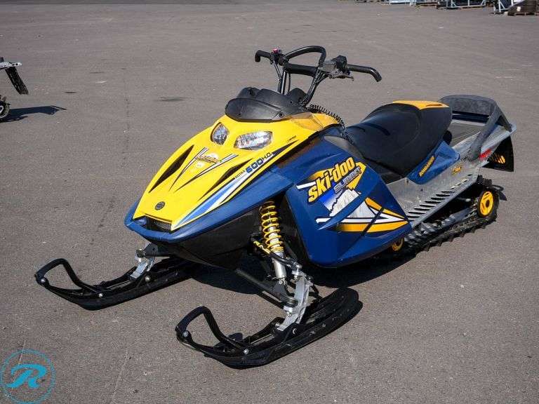 Ski-Doo Summit Rotax 600 H.O. Snowmobile - Roller Auctions