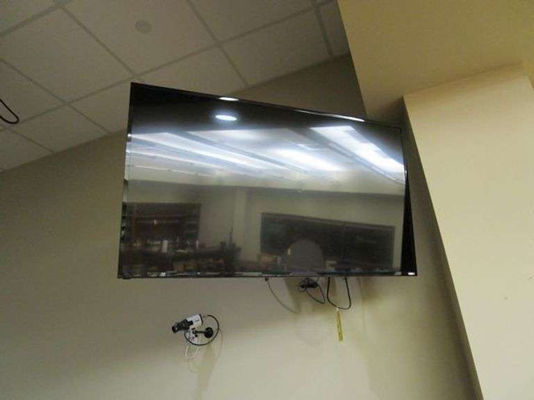 VIZIO APPROX. 57" TV, MOUNTED ON WALL WITH REMOTE - Rosen Systems