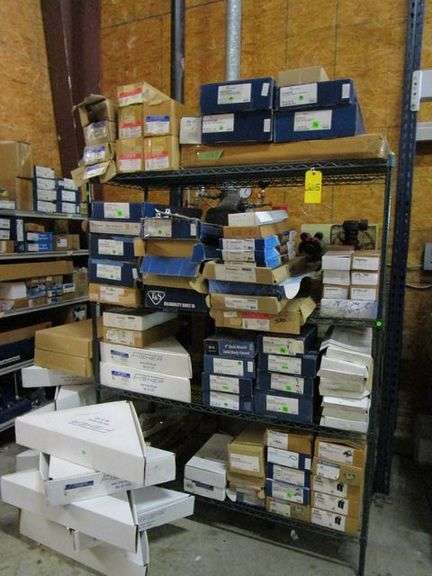 WIRE RACK WITH ASSORTED PLUMBING SUPPLIES IN BOXES AS SHOWN - Rosen Systems