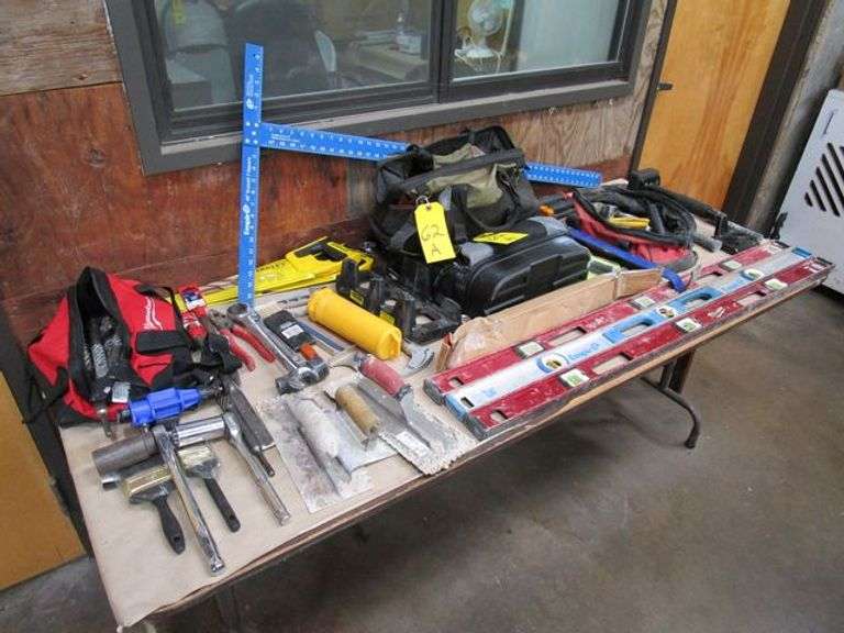 LOT, ASSORTED SMALL HAND TOOLS, DRILL BITS, SAWS, LEVELS AND TOOL BAGS ...