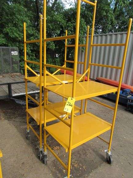 HEAVY DUTY YELLOW METAL PORTABLE RACK, 19" X 33" X 6' TALL, SOLD EMPTY ...
