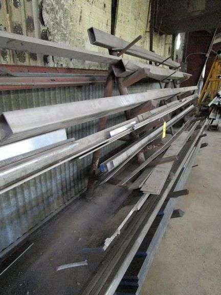 STEEL STORAGE RACK APPROX. 8' LONG, W/ASSORTED STAINLESS STEEL STOCK ...
