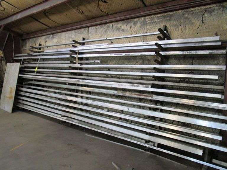 STEEL STORAGE RACK APPROX. 15' LONG X 9' TALL, W/ASSORTED ALUMINUM ...