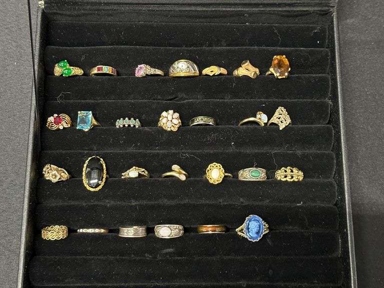 Rings in Display Case - Ryan Cate Auctions and Real Estate