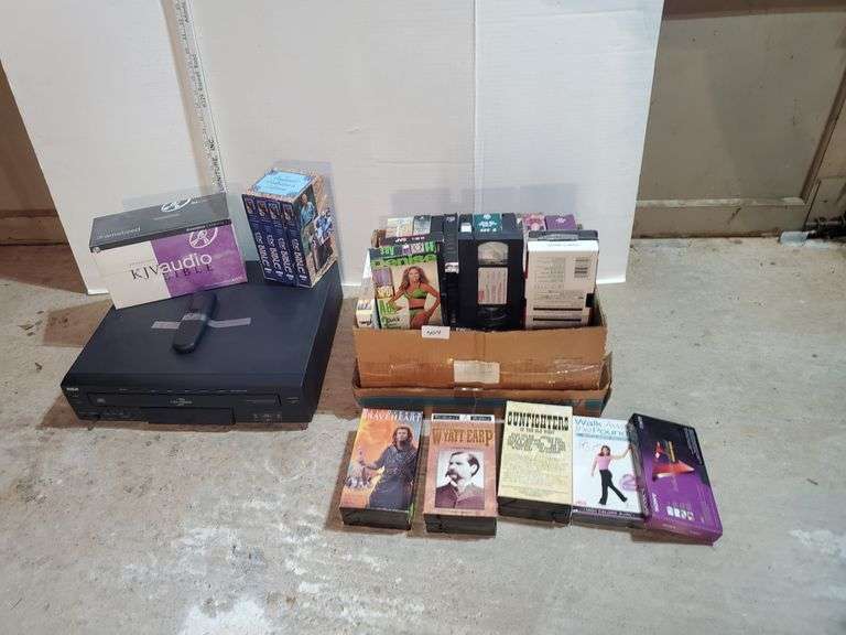 RCA VHS Player abd VHS Tapes (Located Basement Office) - Auction Group