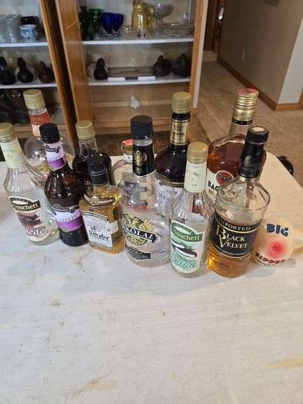 11 Bottles of open bottles of liquor, Rum, Gran Legacy, Everclear ...