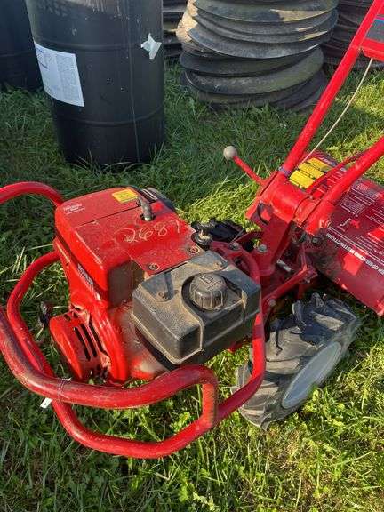 Troy built tiller, works - Schmid Auction