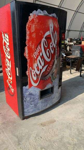 Coca-Cola machine, change works, extra change mechanism, assuming needs ...