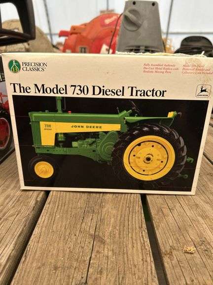 1/16 scale The model 730 Diesel tractor - Schmid Auction