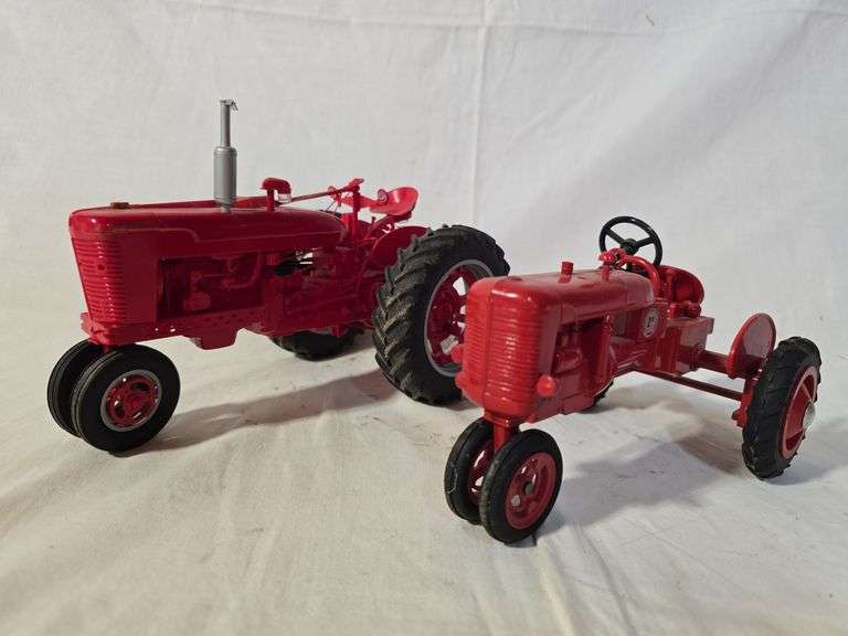2 Farmall Plastic Tractors, 1/16th scale - Schmid Auction