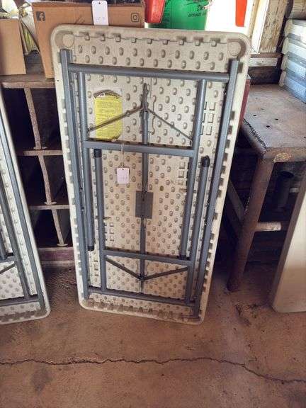 4ft folding table. - Schmid Auction