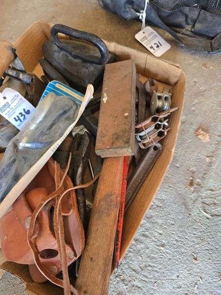 Winch strap hook, cast iron, hammer, channel locks, misc. tools ...