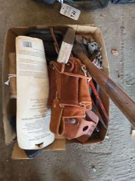 Winch strap hook, cast iron, hammer, channel locks, misc. tools ...