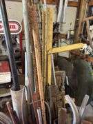 Metal Barrel with assortment of steel, Angle Iron, T Post, and misc ...