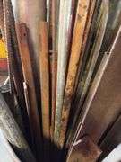 Metal Barrel with assortment of steel, Angle Iron, T Post, and misc ...