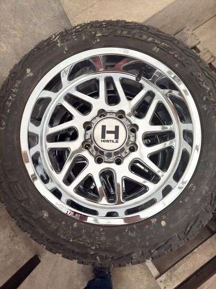 Hostile sprocket chrome rims with 275/55R20 Ealken wildpeaks 50% tread ...