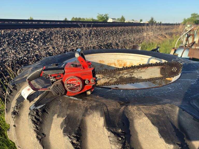 Homelite Chainsaw - Schmid Auction