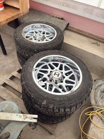 Hostile sprocket chrome rims with 275/55R20 Ealken wildpeaks 50% tread ...