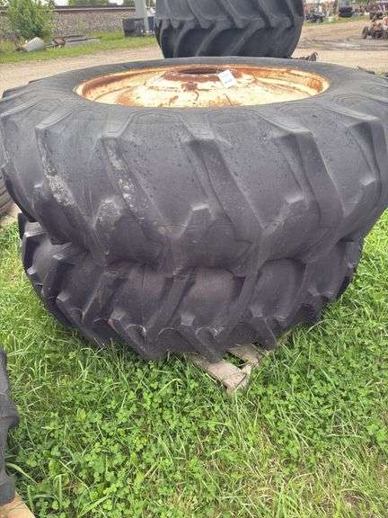 Pair of Firestone 28L-26 Rice Tires on Rim - Schmid Auction