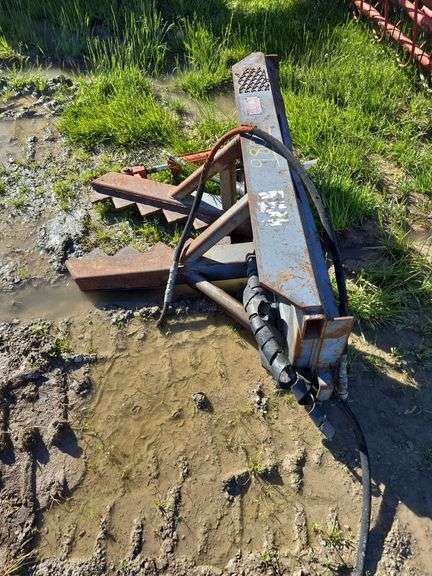 Skid steer puller attachments - Schmid Auction