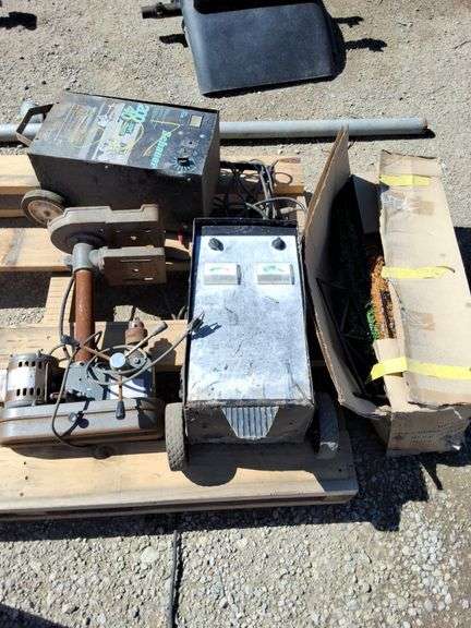 Battery Chargers, small drill press, and Christmas tree - Schmid Auction