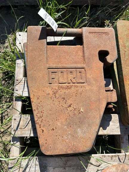 2 Ford suitcase weights - Schmid Auction