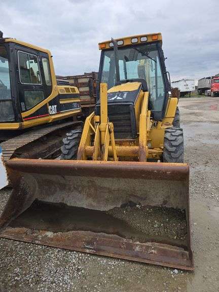 CAT 416D backhoe, extend hoe, extra, bucket teeth, out riggers, 4 stick ...