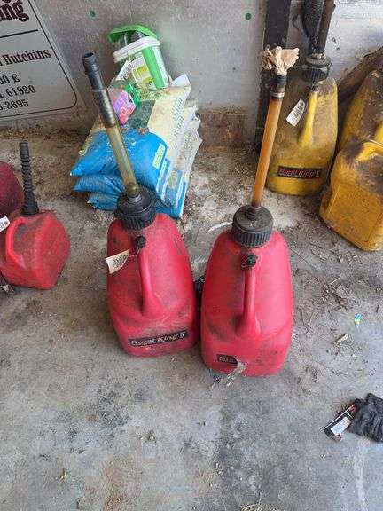 Two five-gallon gas jugs - Schmid Auction