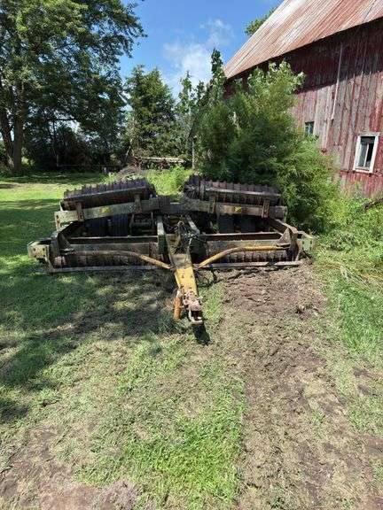 Kewanee 20ft Culti-Mulcher, small tree growing in - Schmid Auction