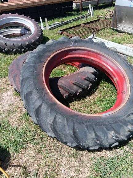 2 Farmall tires with, rims, 13.6-38/12-38 - Schmid Auction