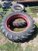 2 Farmall tires with, rims, 13.6-38/12-38 - Schmid Auction