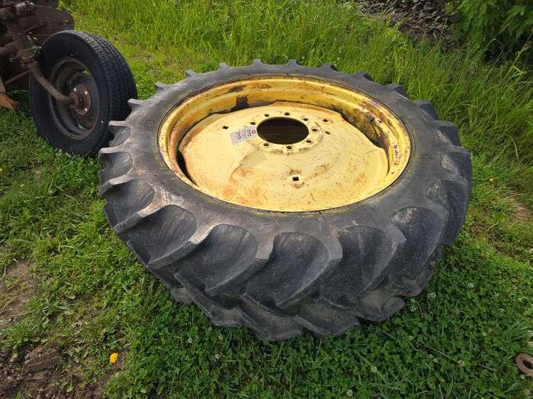 2 Rims and Tires on 9 bolt, 11.2-34, JD B, M, 40 - Schmid Auction
