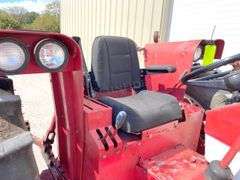 International 656 gas utility tractor w/ loader - Schneider Auctioneers LLC
