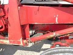 International 656 gas utility tractor w/ loader - Schneider Auctioneers LLC